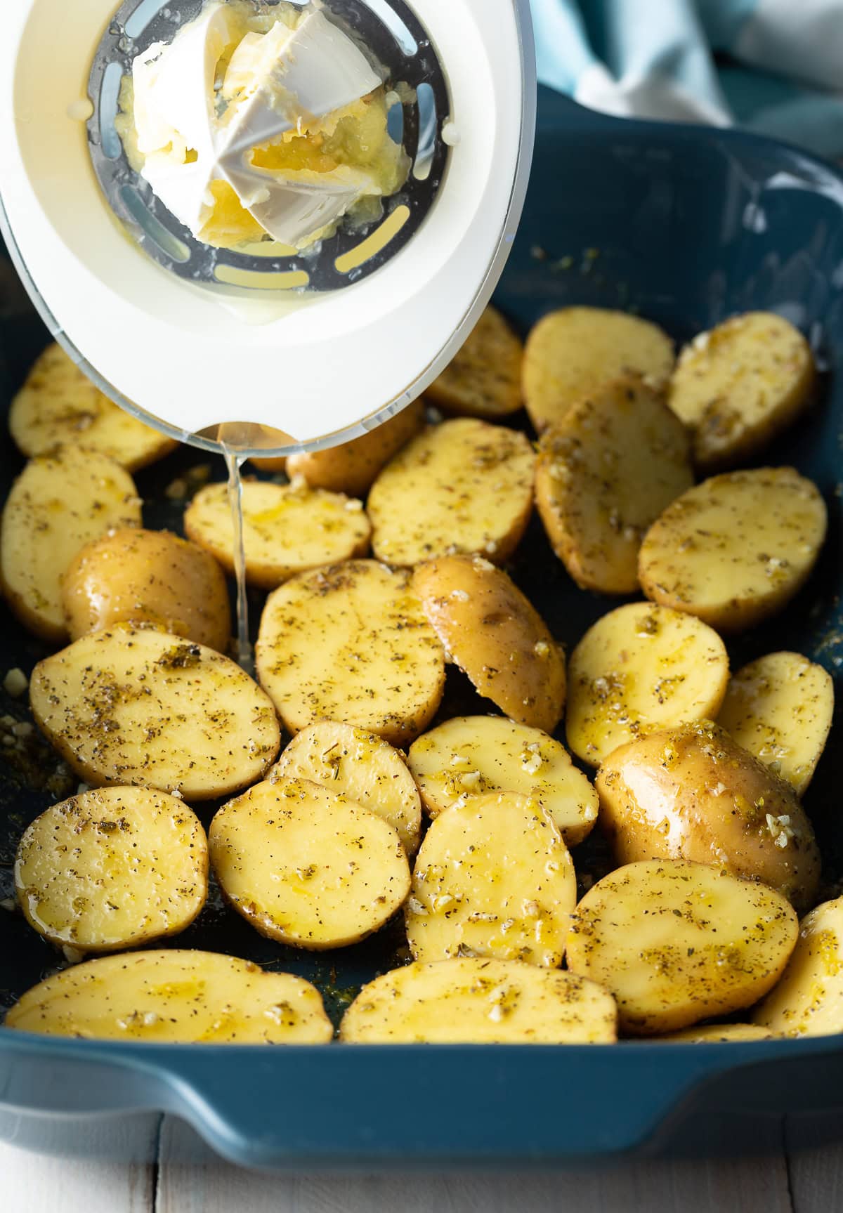 Roasted Greek Lemon Garlic Potatoes Recipe (VIDEO) - A Spicy Perspective