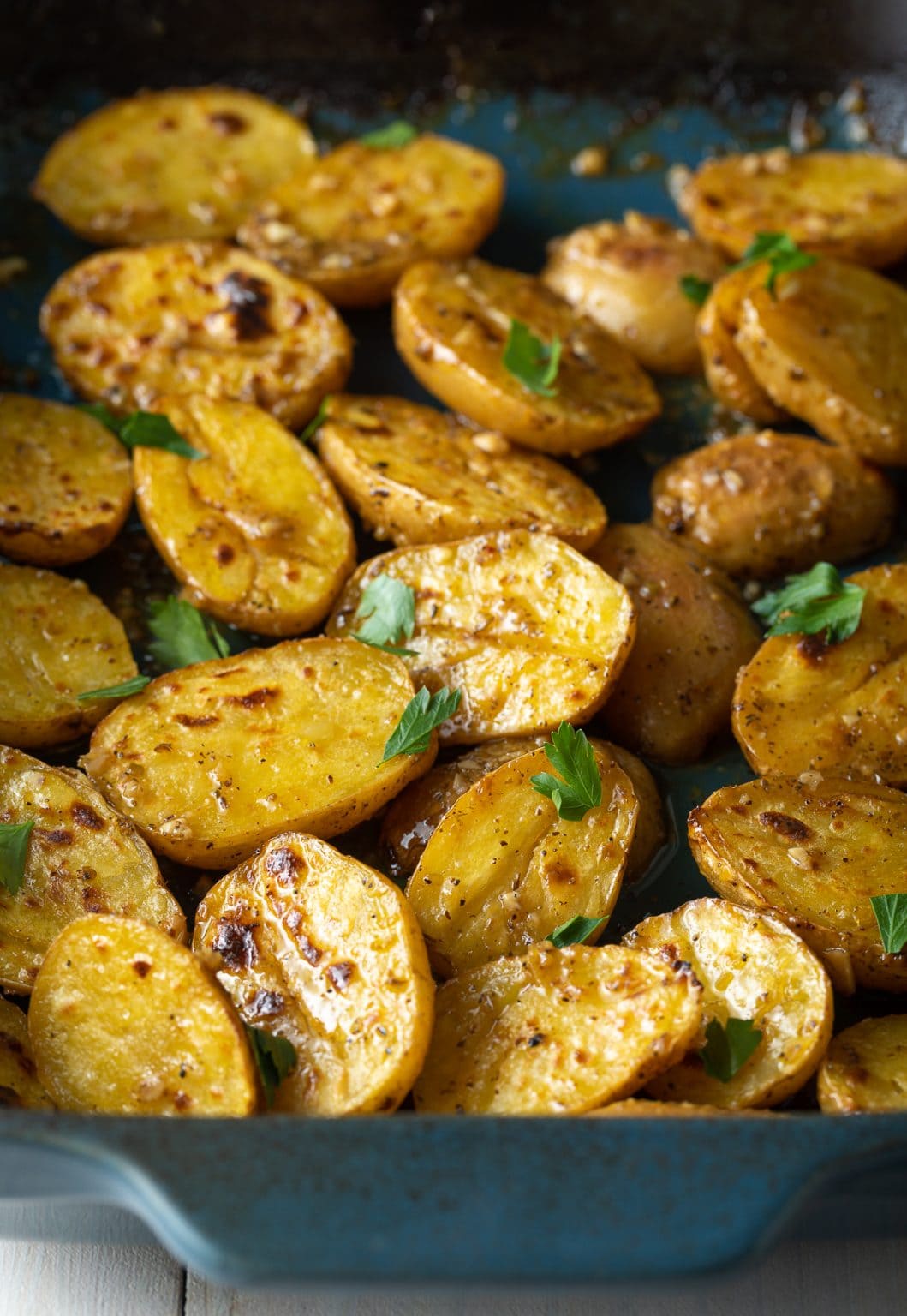Greek Lemon Garlic Potatoes Recipe (VIDEO) - A Spicy Perspective