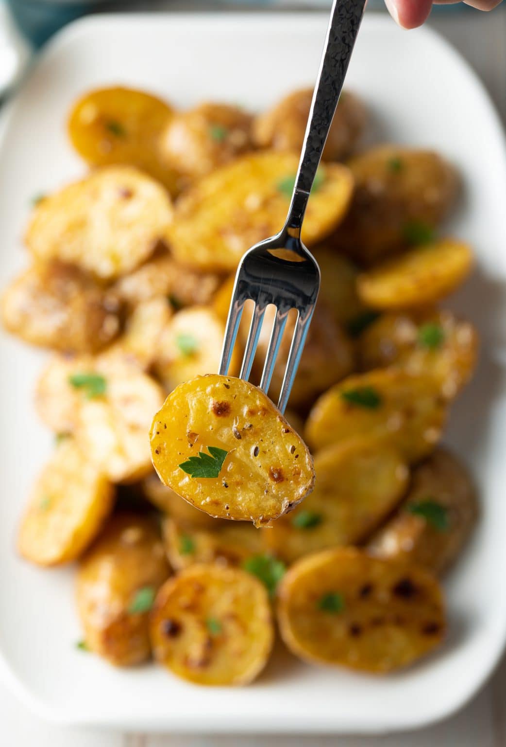 Roasted Greek Lemon Garlic Potatoes Recipe (VIDEO) - A Spicy Perspective
