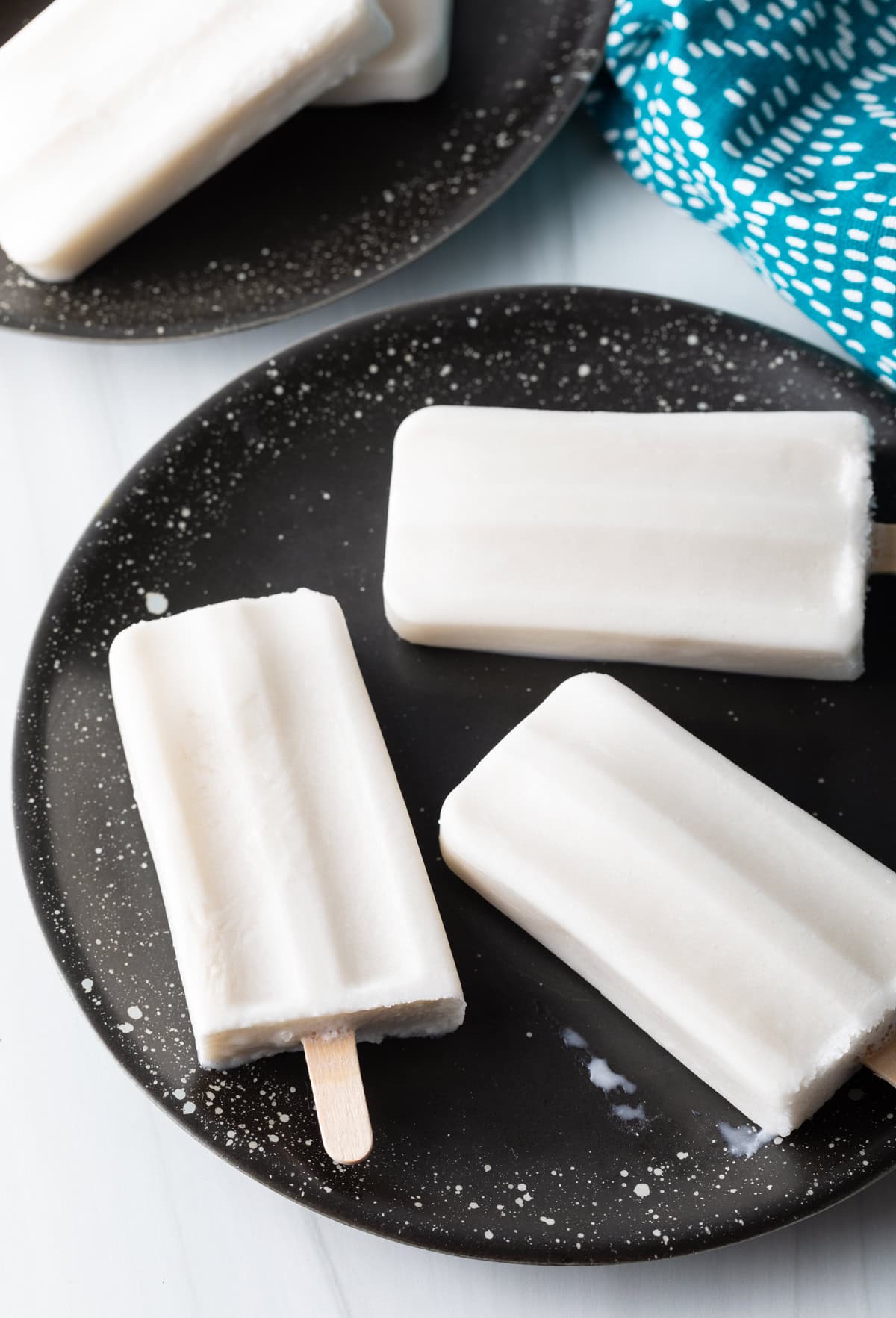 Coconut Popsicles (Dairy Free) - A Spicy Perspective