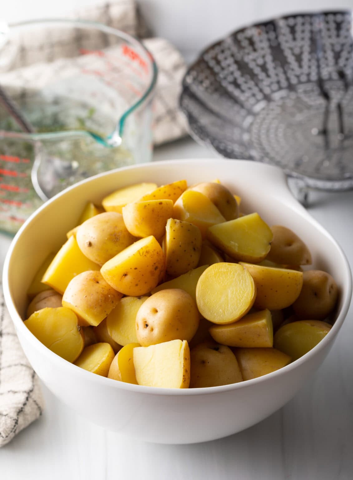 Steamed Potatoes with Garlic Herb Butter - A Spicy Perspective