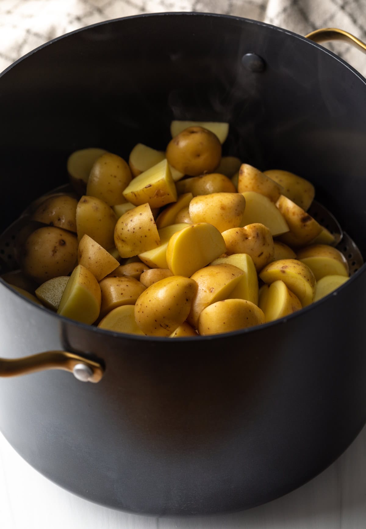 Steamed Potatoes with Garlic Herb Butter - A Spicy Perspective