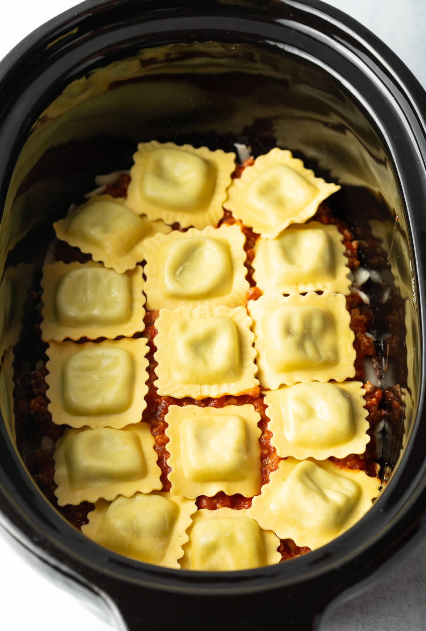 Crockpot Ravioli Lasagna Casserole Recipe (Video) - A Spicy Perspective
