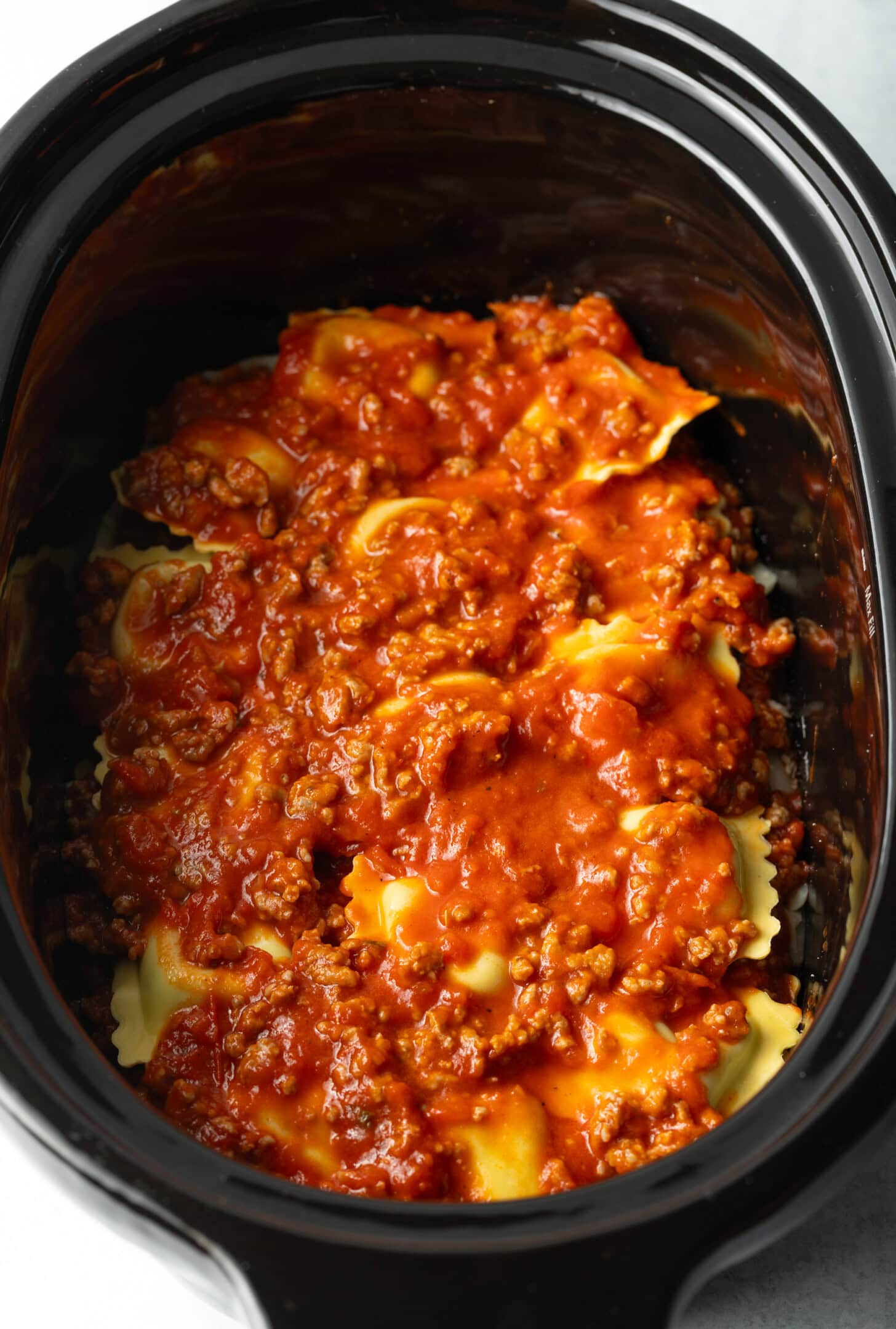 Crockpot Ravioli Lasagna Casserole Recipe (Video) - A Spicy Perspective