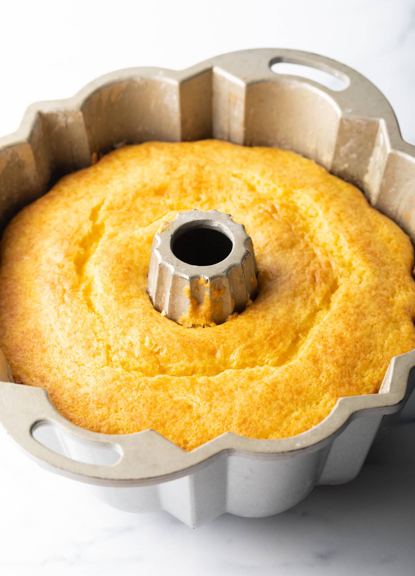Pineapple Upside Down Bundt Cake Recipe (Video) - A Spicy Perspective